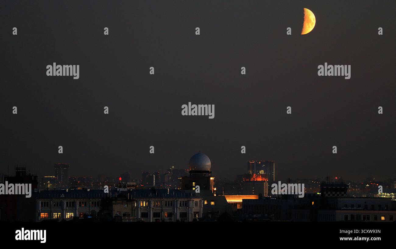 Yellow moon and roofs hi-res stock photography and images - Alamy