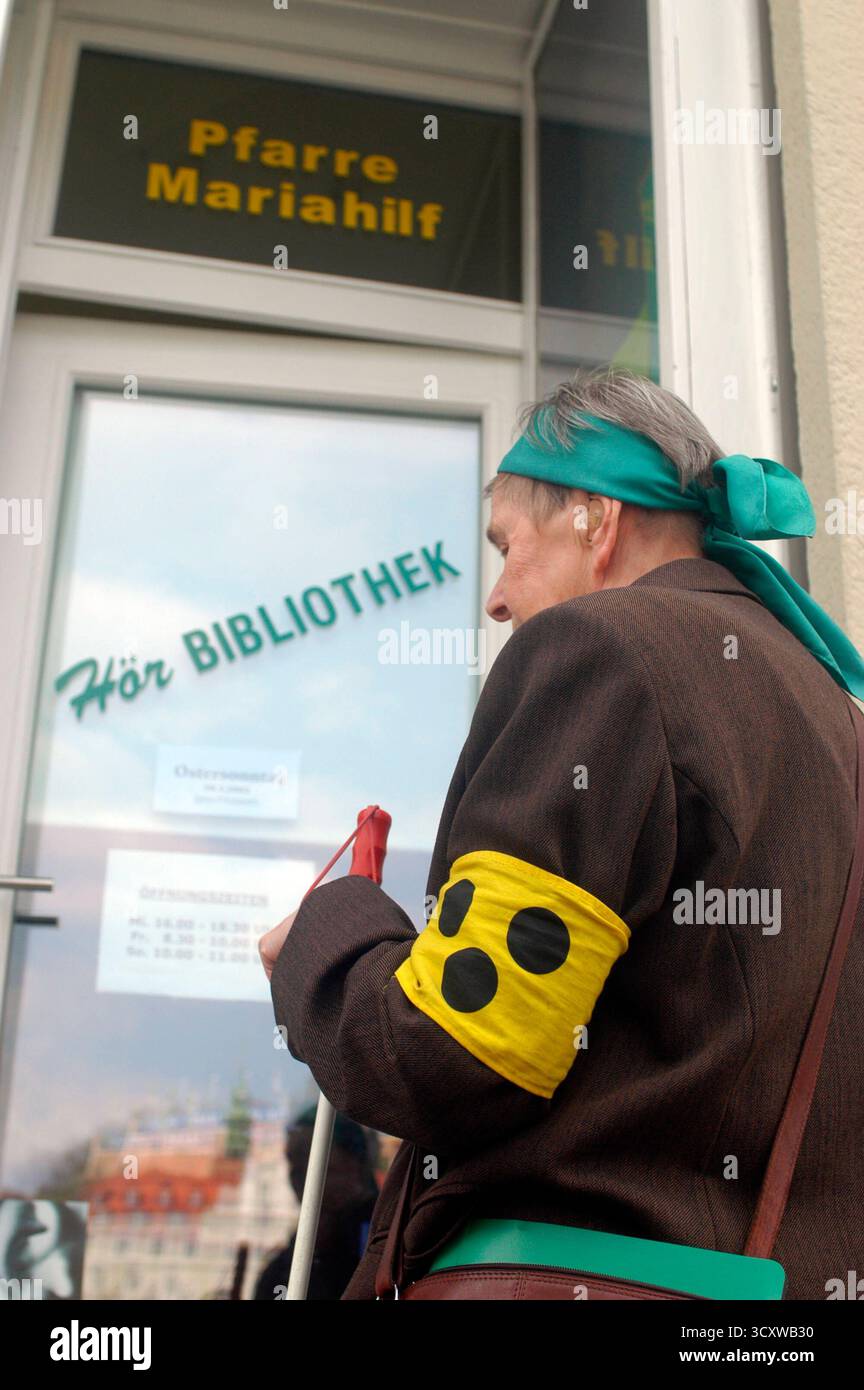a yellow blind loop symbol with three black dots, visual impairment ...