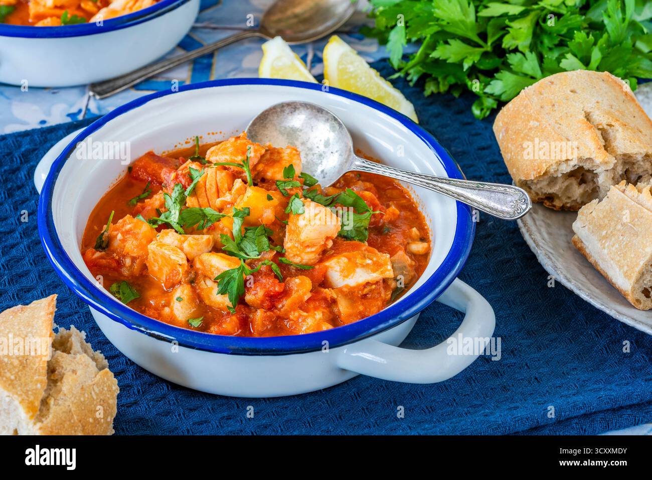 Fish stew made of cod, salmon, smoked haddock and prawns Stock Photo ...