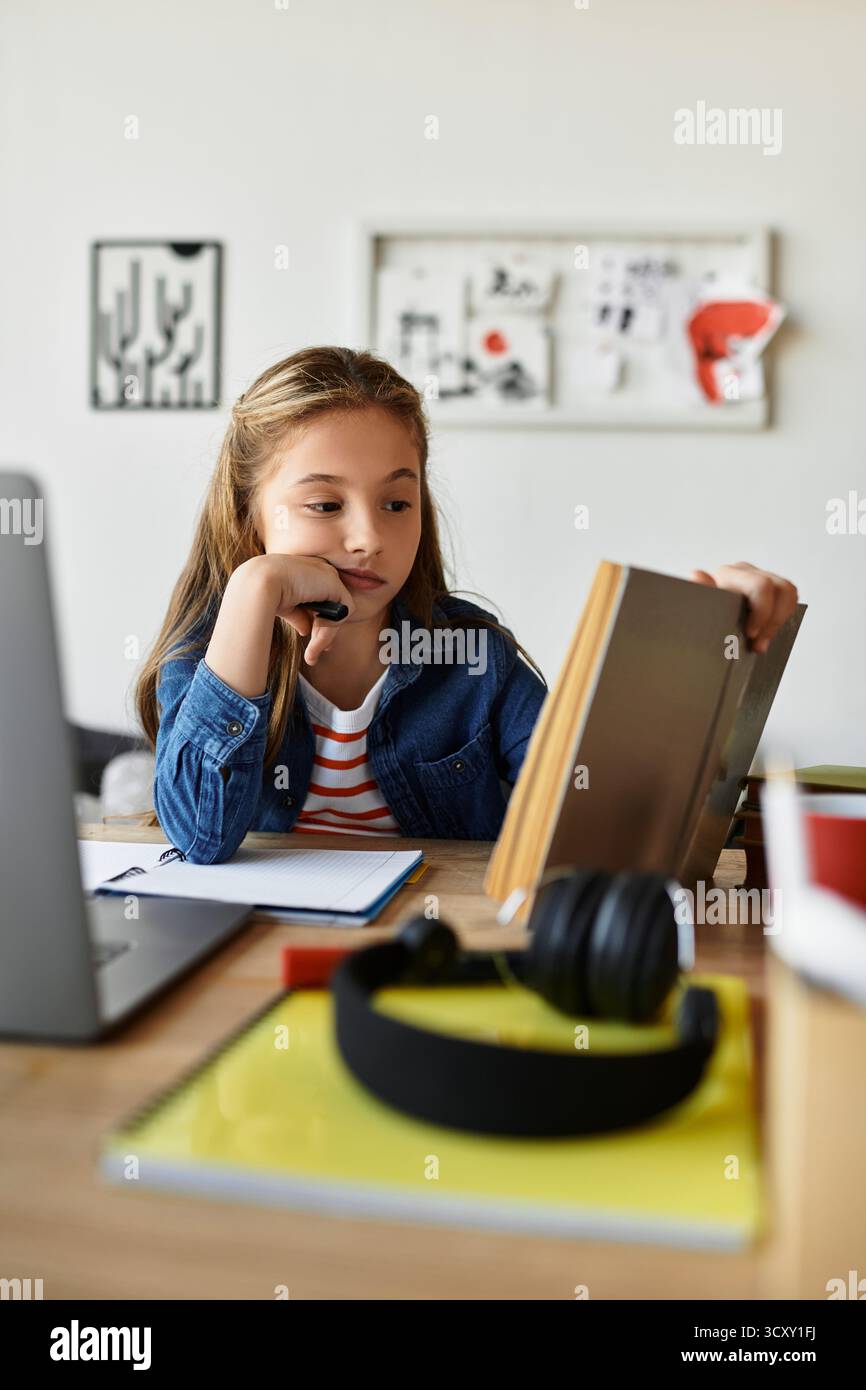 A generation alpha girl immersed in a book while surrounded by her ...