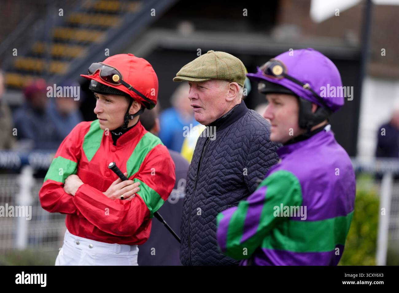 Trainer Gary Moore (centre) at Brighton racecourse. Picture date ...