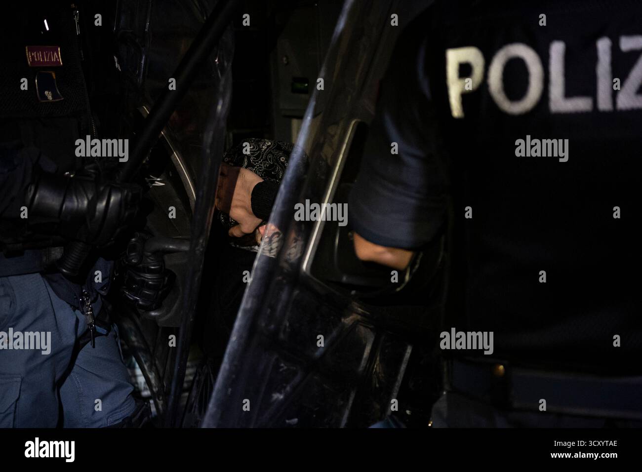 Person Arrested Between Police Officers Stock Photo Alamy