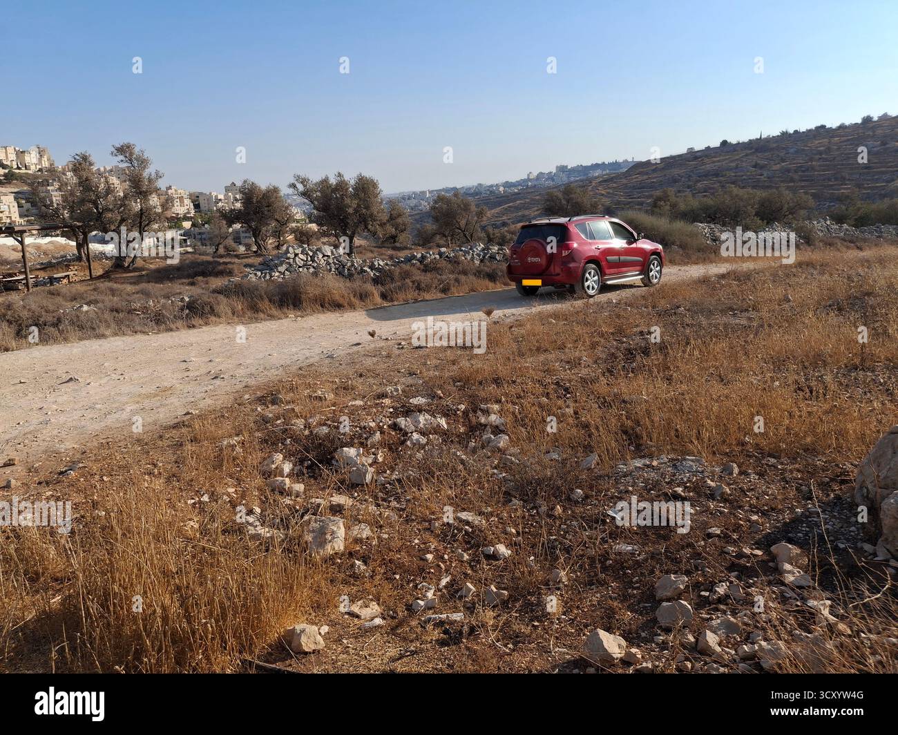 Toyota Rav 4 red Car on an Off-road in the Mountain landscape Stock ...