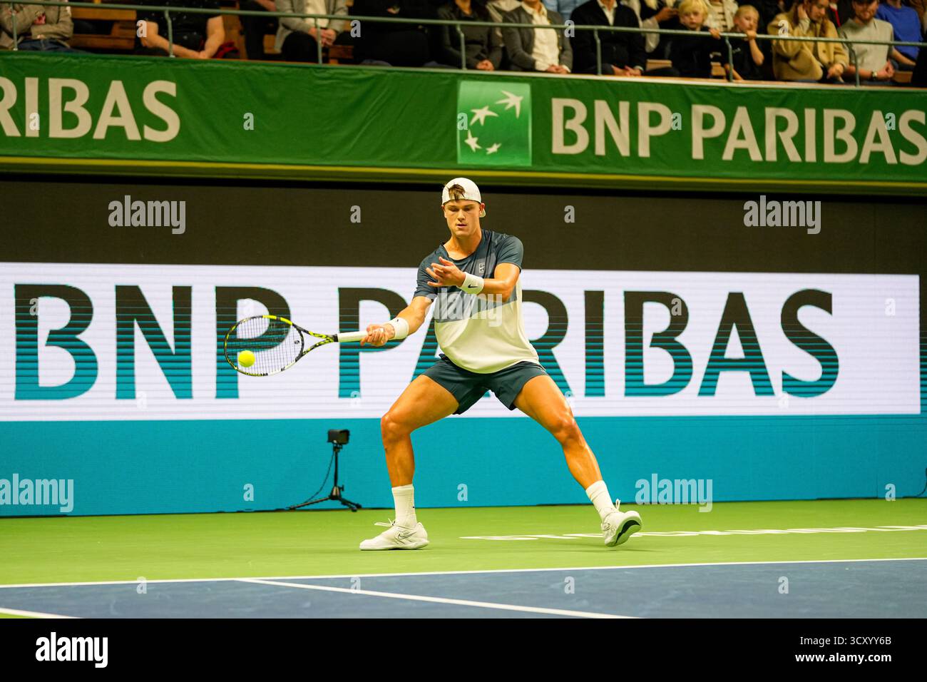 Danish tennis player Holger Rune in action against Marton Fucsovics of ...