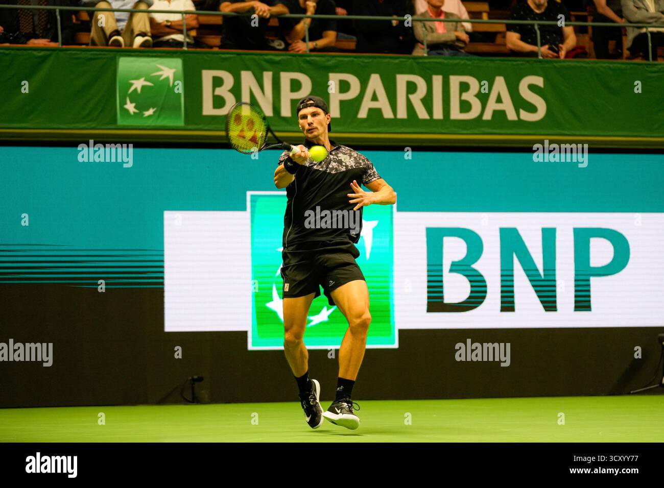Danish tennis player Holger Rune in action against Marton Fucsovics of ...