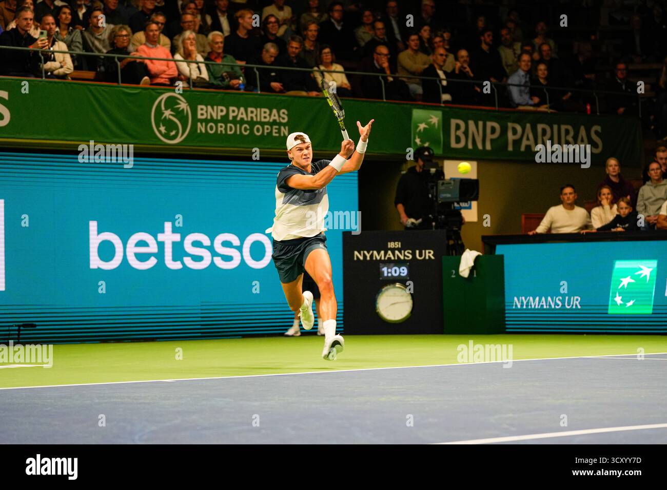 Danish tennis player Holger Rune in action against Marton Fucsovics of ...