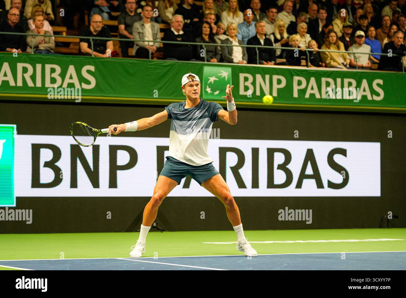 Danish tennis player Holger Rune in action against Marton Fucsovics of ...