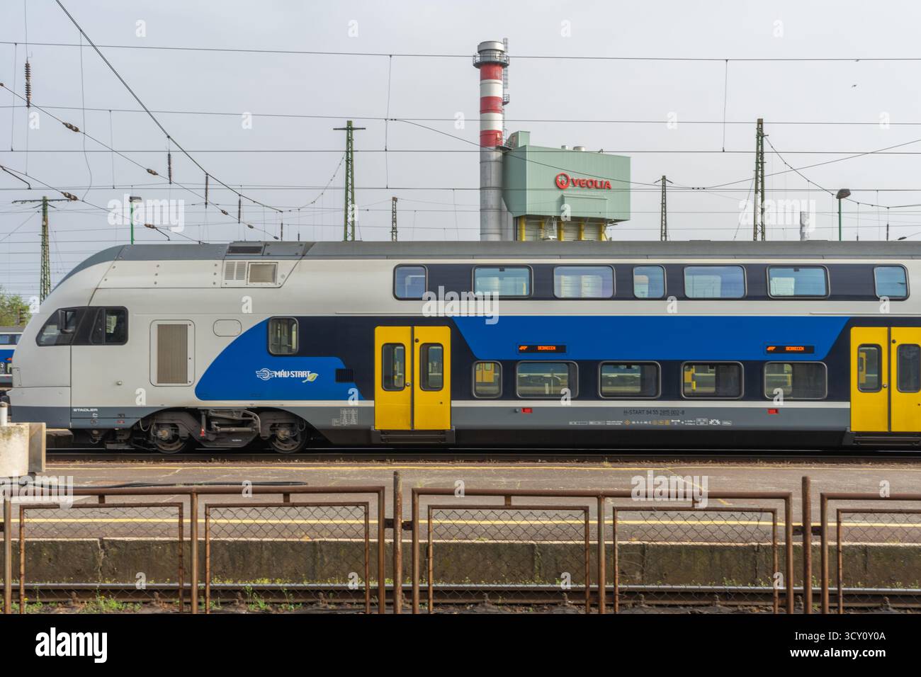 Modern double-decker MÁV-Start train at a Hungarian railway station ...