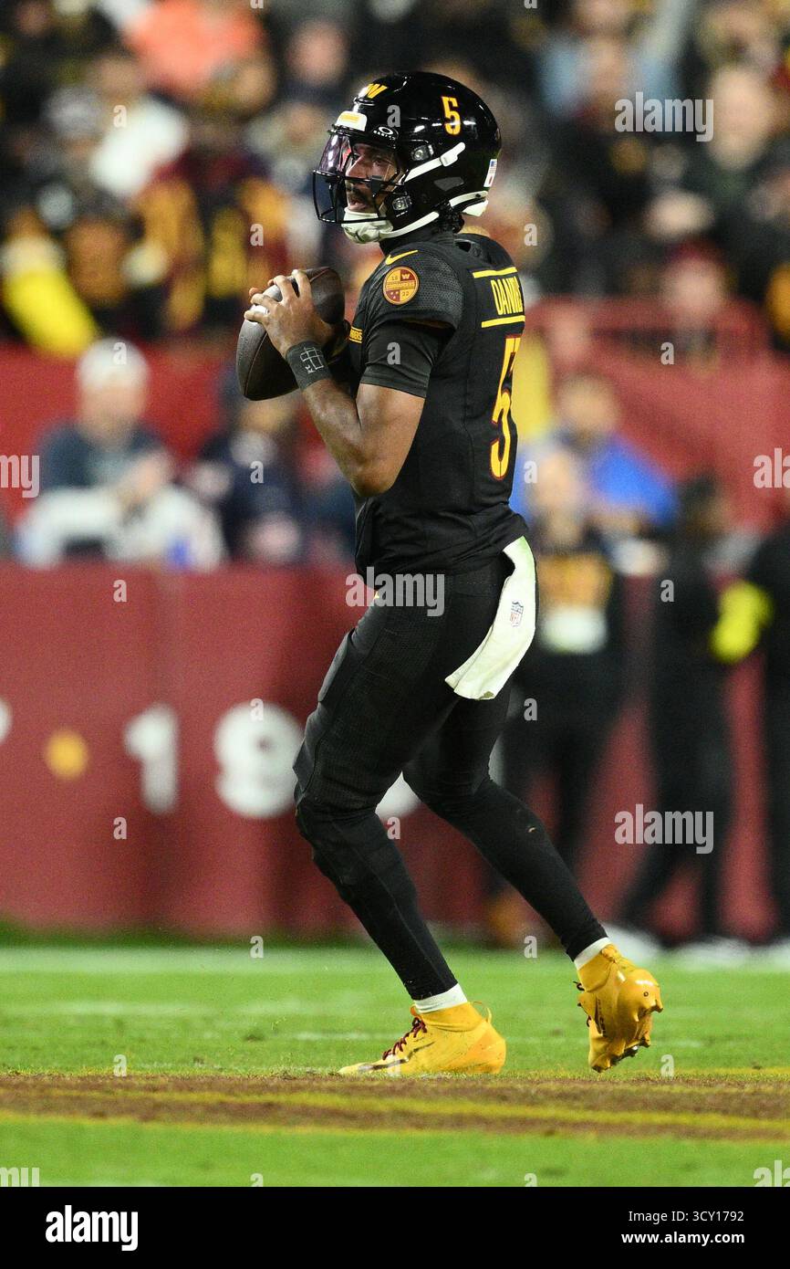 Washington Commanders quarterback Jayden Daniels (5) in action during ...