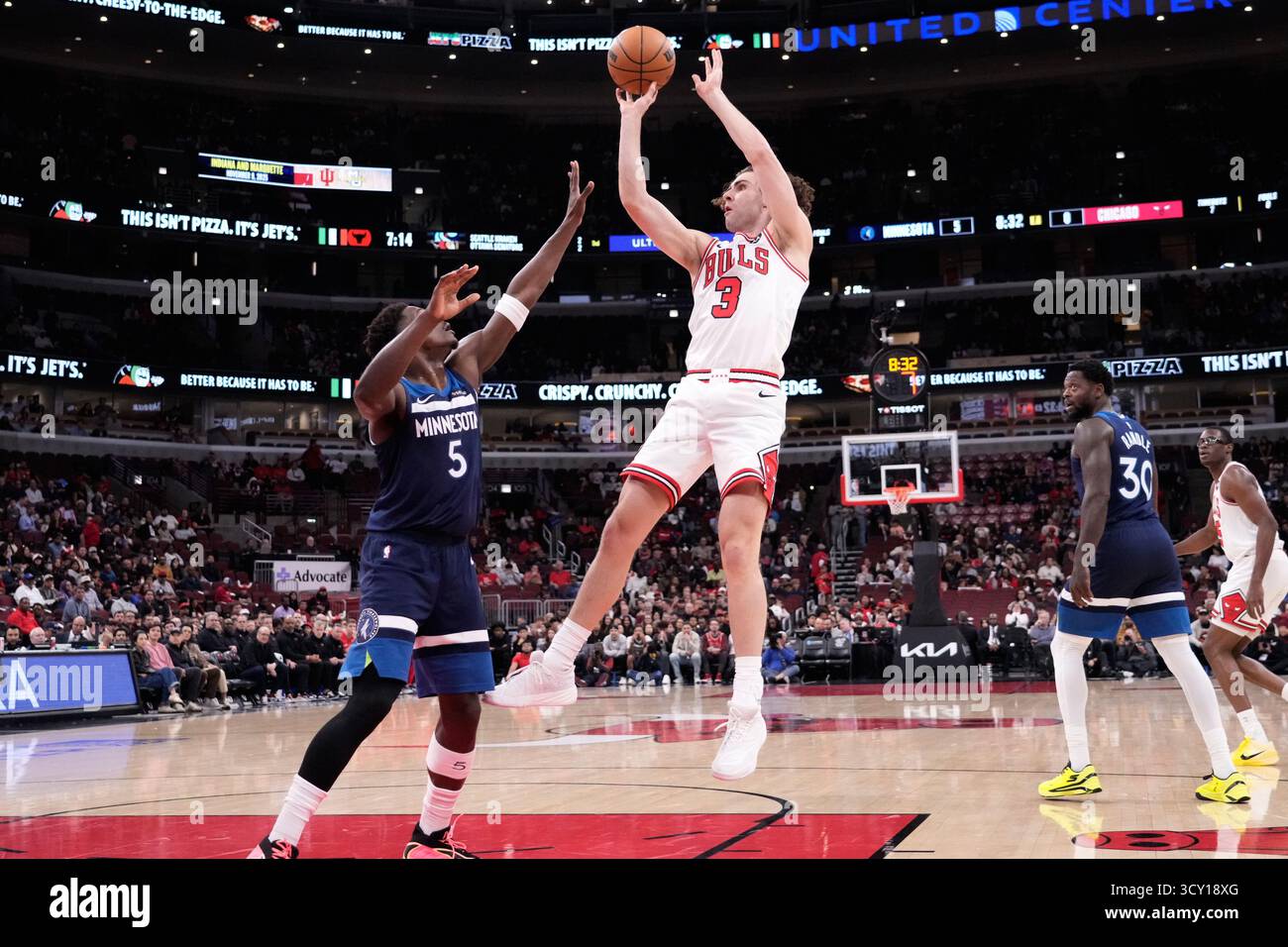 Chicago Bulls guard Josh Giddey, right, shoots over Minnesota ...