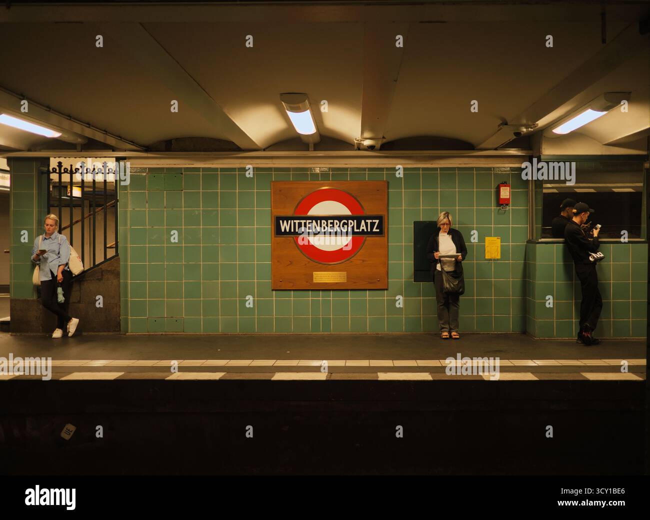 Green tiled wall and classic roundel sign. A cinematic, shadowy ...