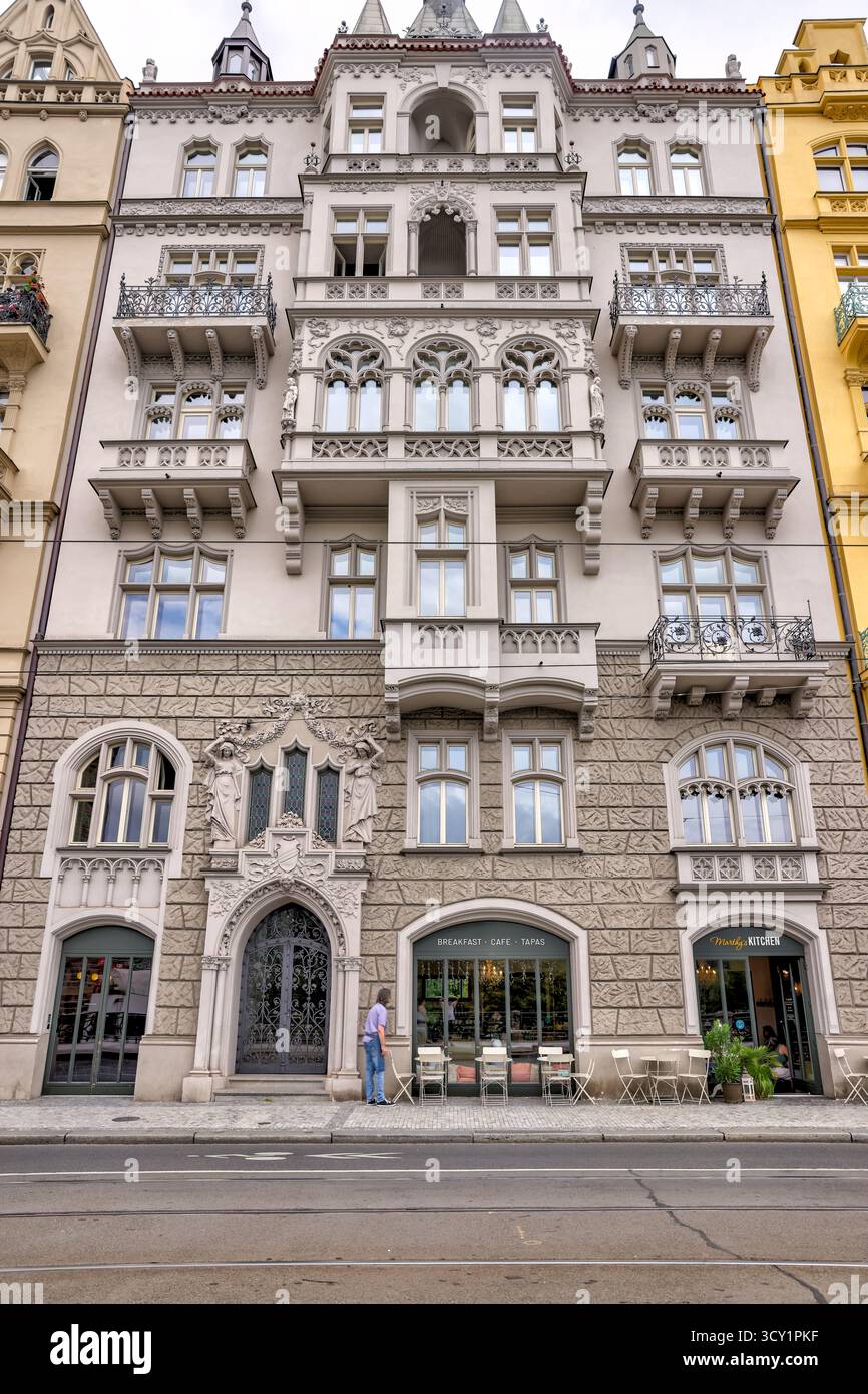 Ornate historic buildings at a street corner in central Prague, Czech ...