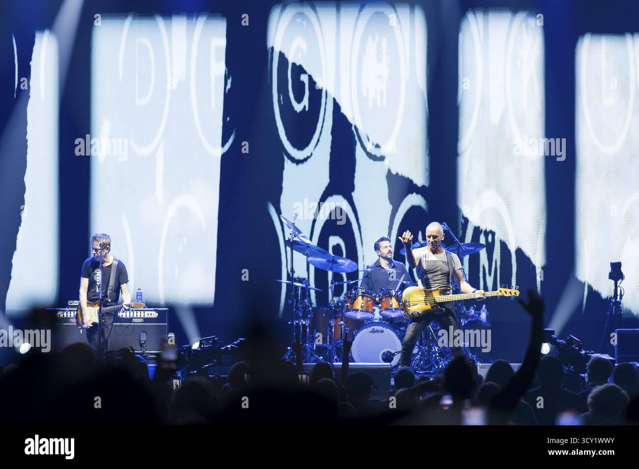 Dominic Miller (guitarist), Chris Maas (drummer), Sting (guitarist ...