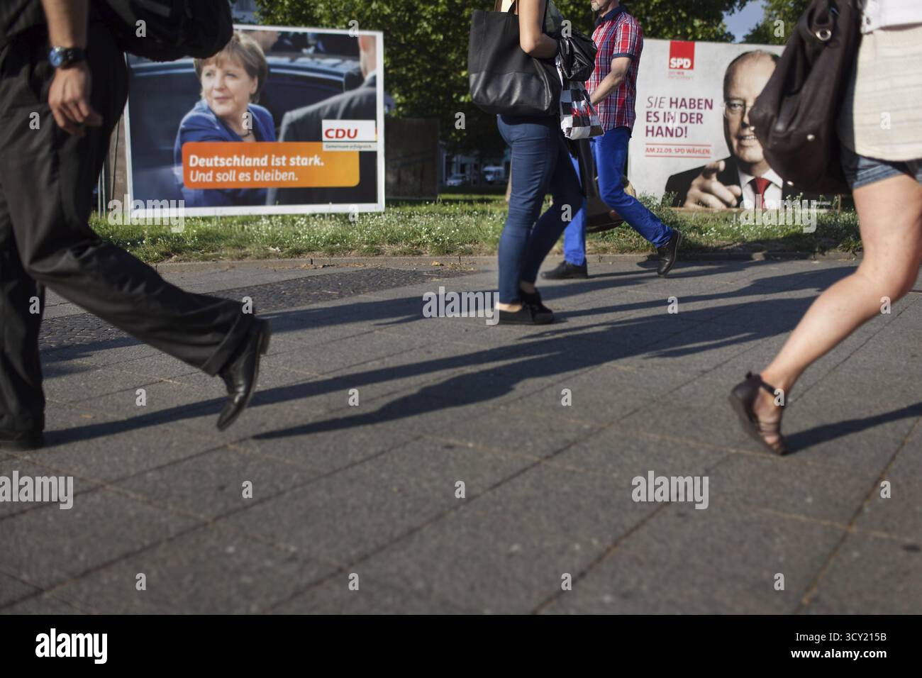 DEU Germany Germany Berlin Pedestrians pass the election posters of ...