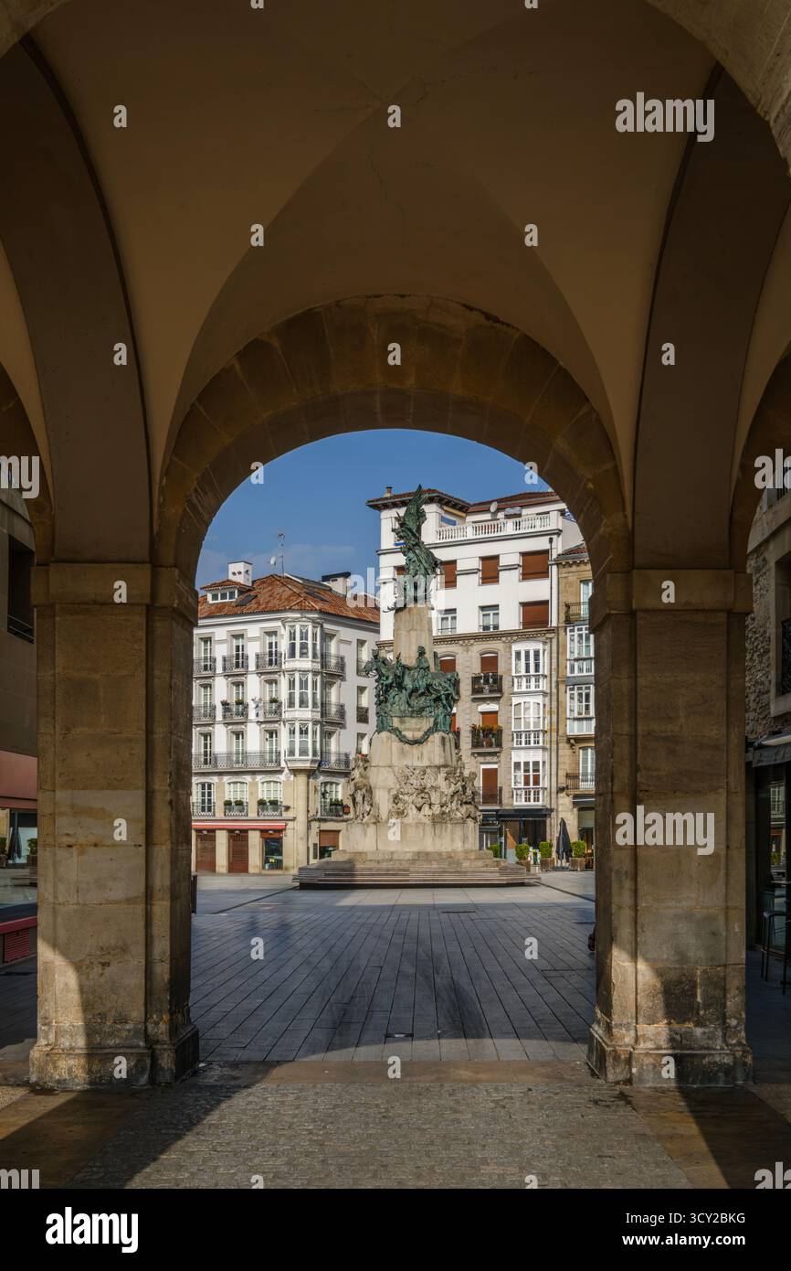 Iconic Battle of Vitoria monument framed by historic stone arches at ...