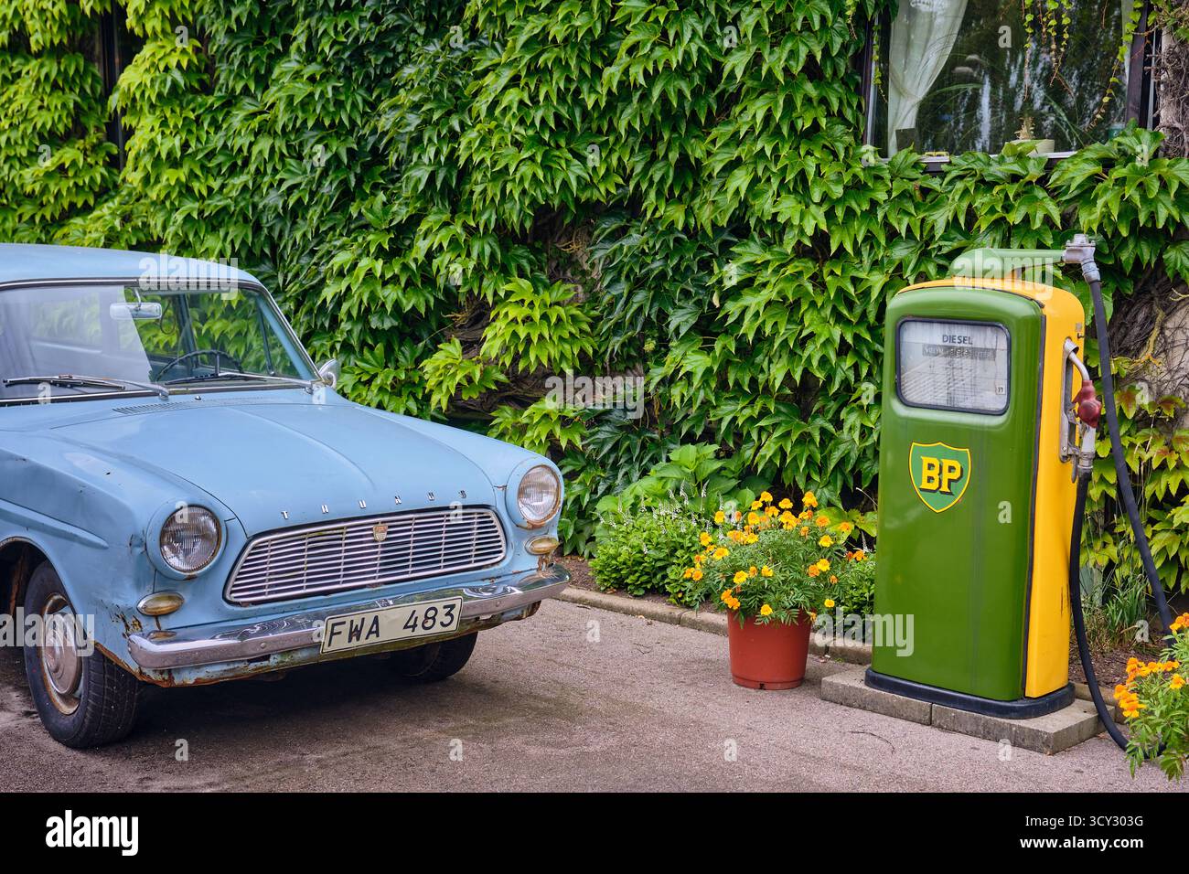 Harlösa, Sweden ; July 26, 2025: Blue Ford Taunus parked next to ...