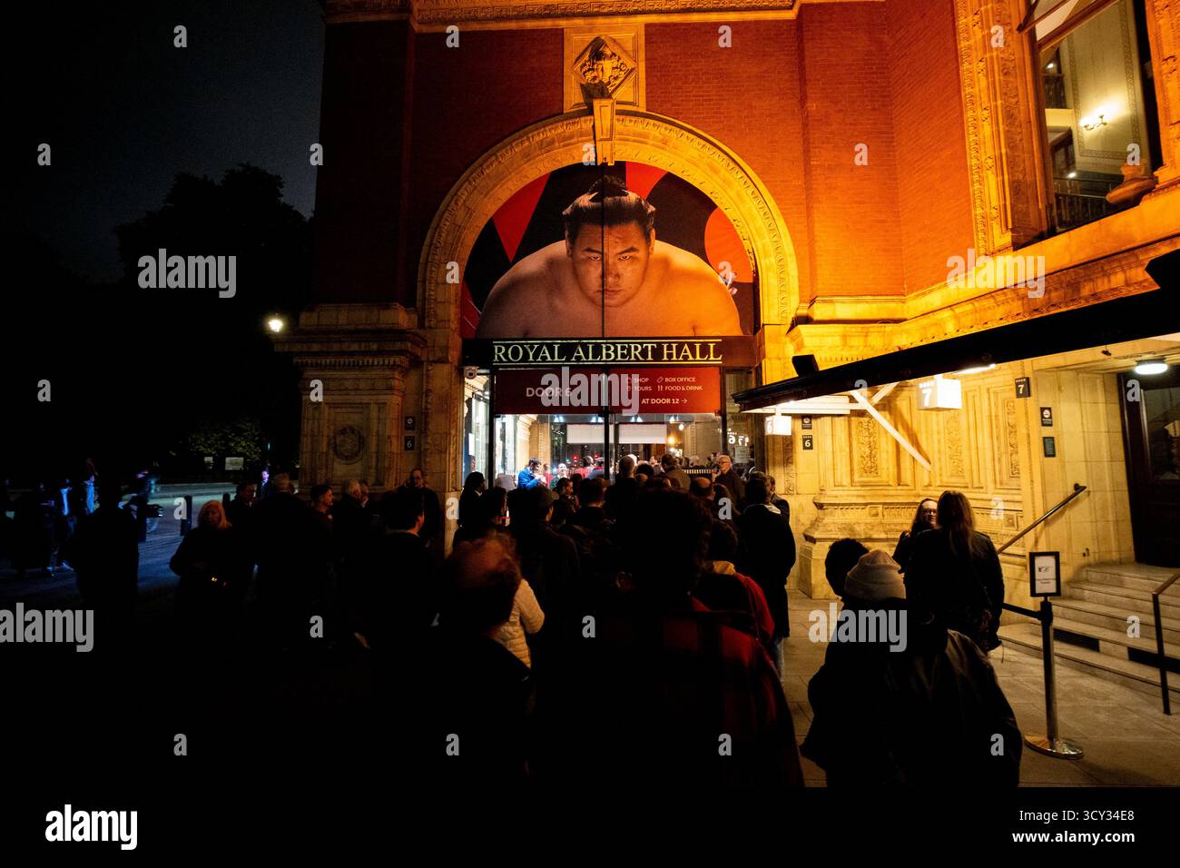 People arrive on day two of the Grand Sumo Tournament at the Royal ...