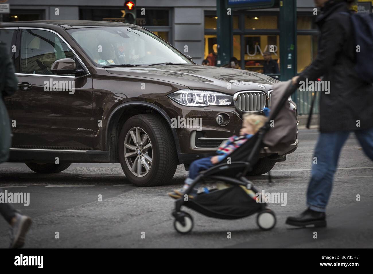 DEU Germany Germany Berlin Street scenes with SUVs at the intersection ...