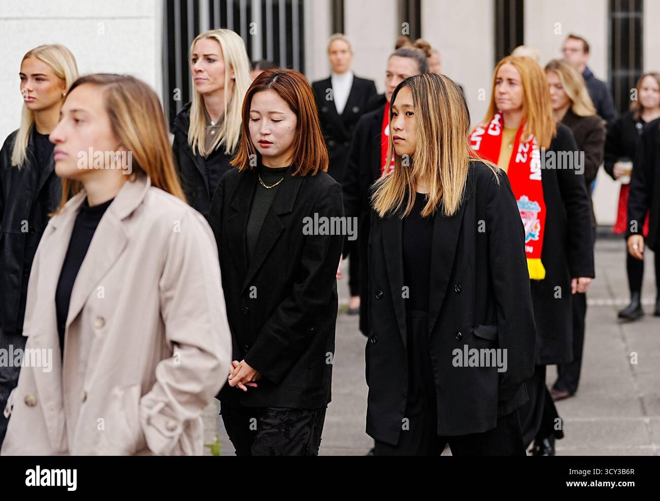 Liverpool's Risa Shimizu (centre left) arriving at the memorial service ...