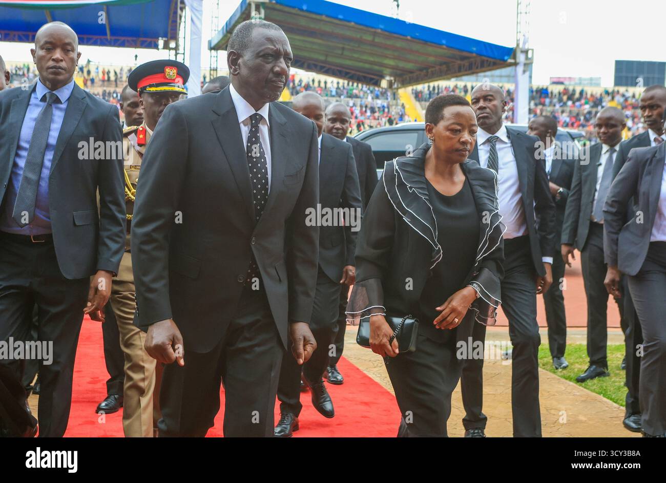 Kenya President William Ruto, front left, and his wife Rachael arrive at a state funeral for ...