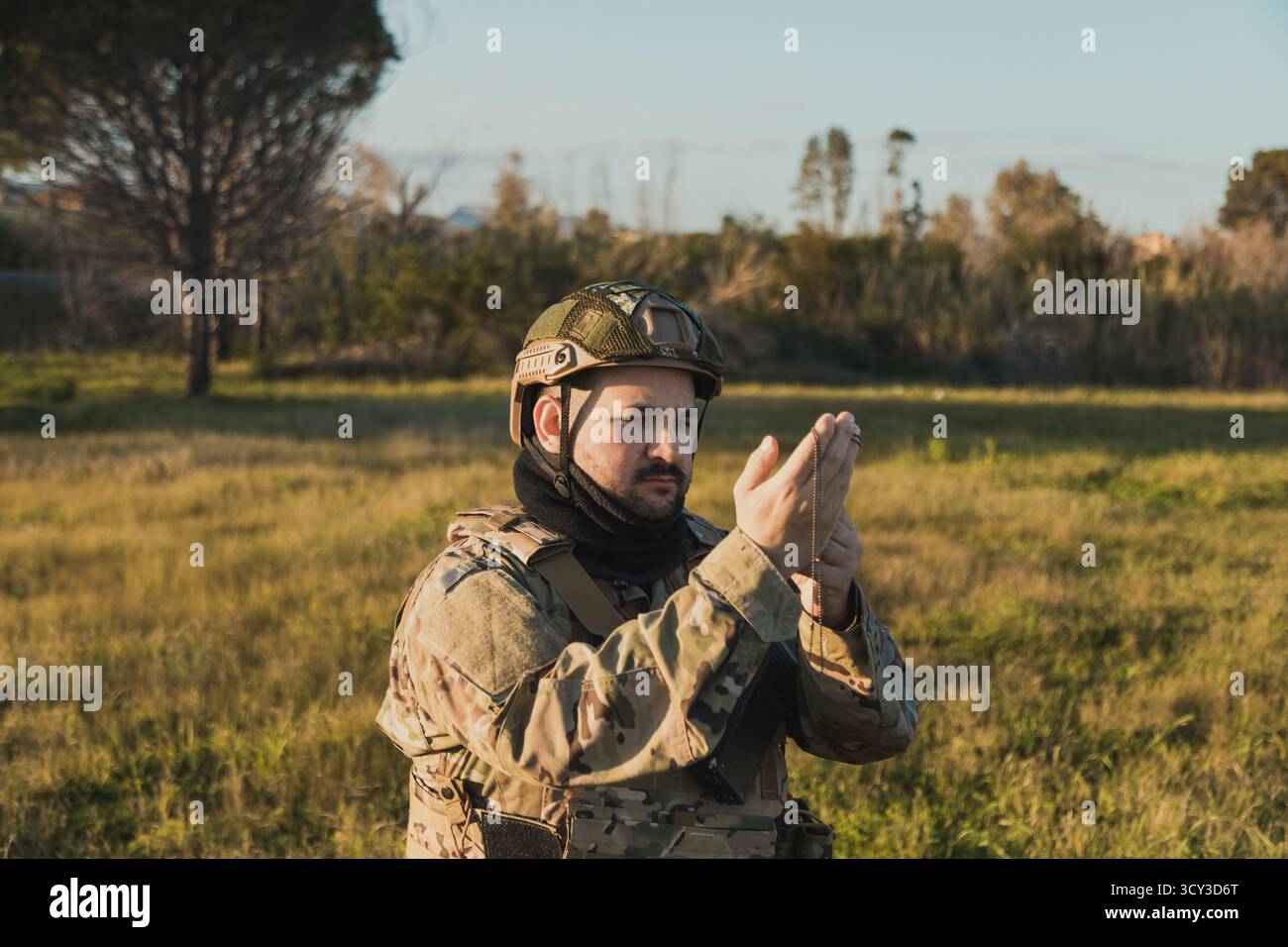 Soldier Holding In His Hands The Dog Tags Of An Ally Stock Photo - Alamy