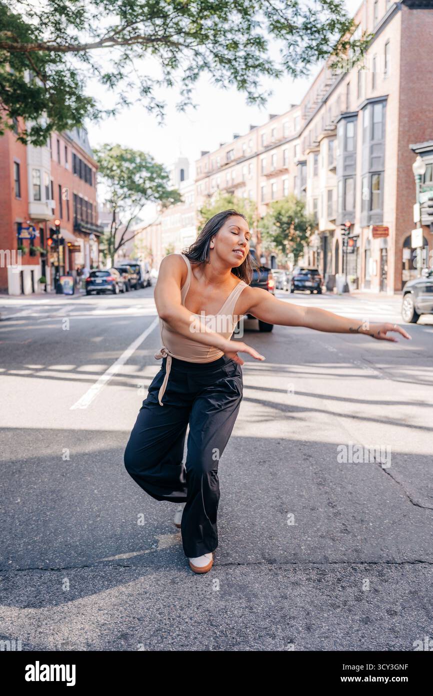 Woman dancing freely in hi-res stock photography and images - Alamy