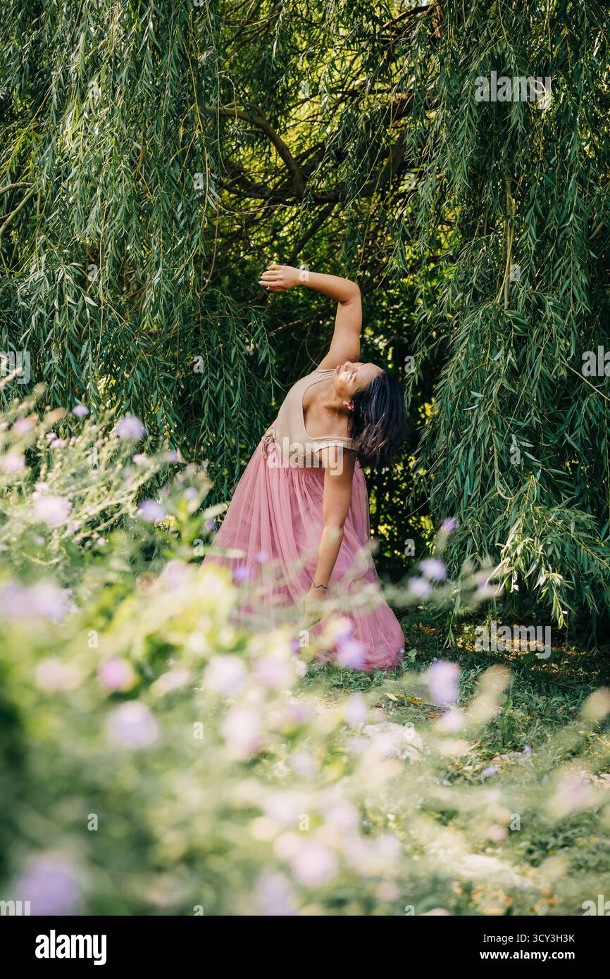 Woman dancing stretching under hi-res stock photography and images - Alamy