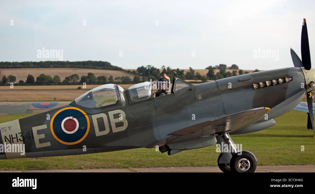 The Pilot waving from the Supermarine Spitfire Mk IXT x2 (NH341), after ...