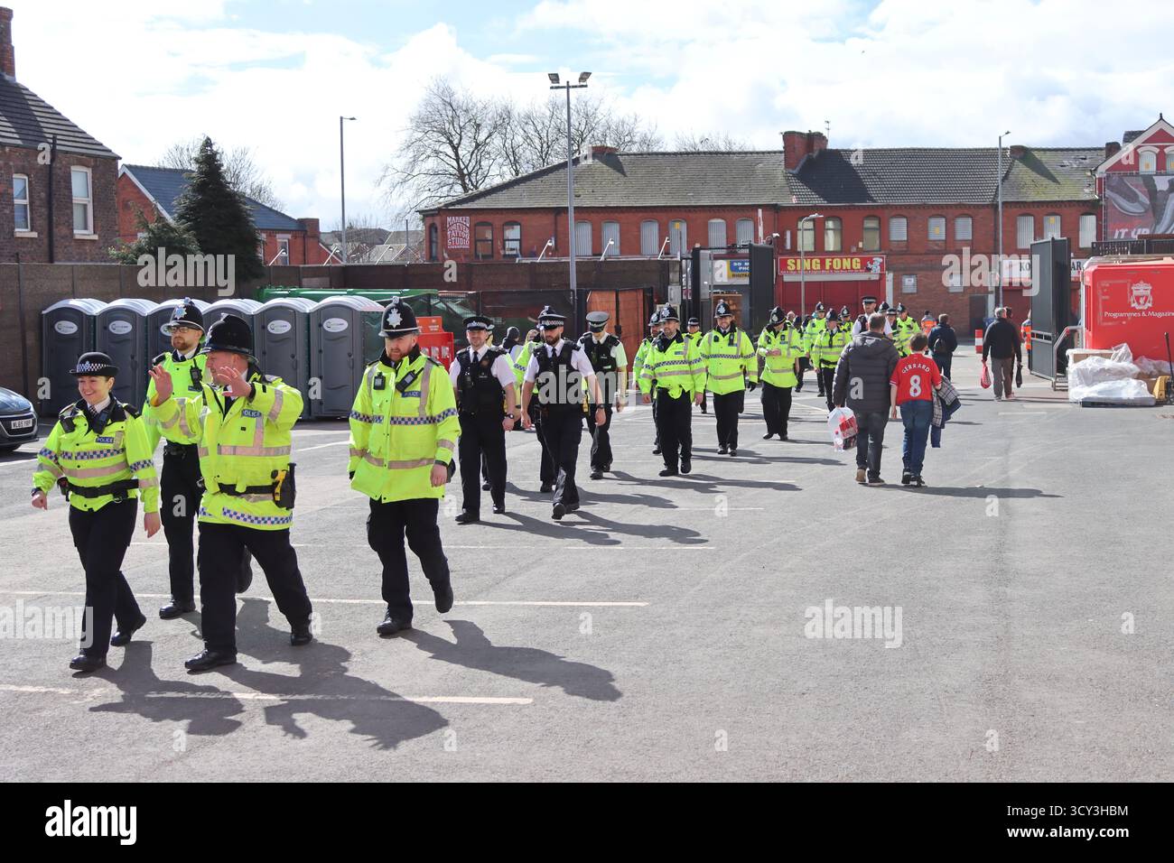Stewards in front of Anfield Liverpool FC Football club Stock Photo - Alamy