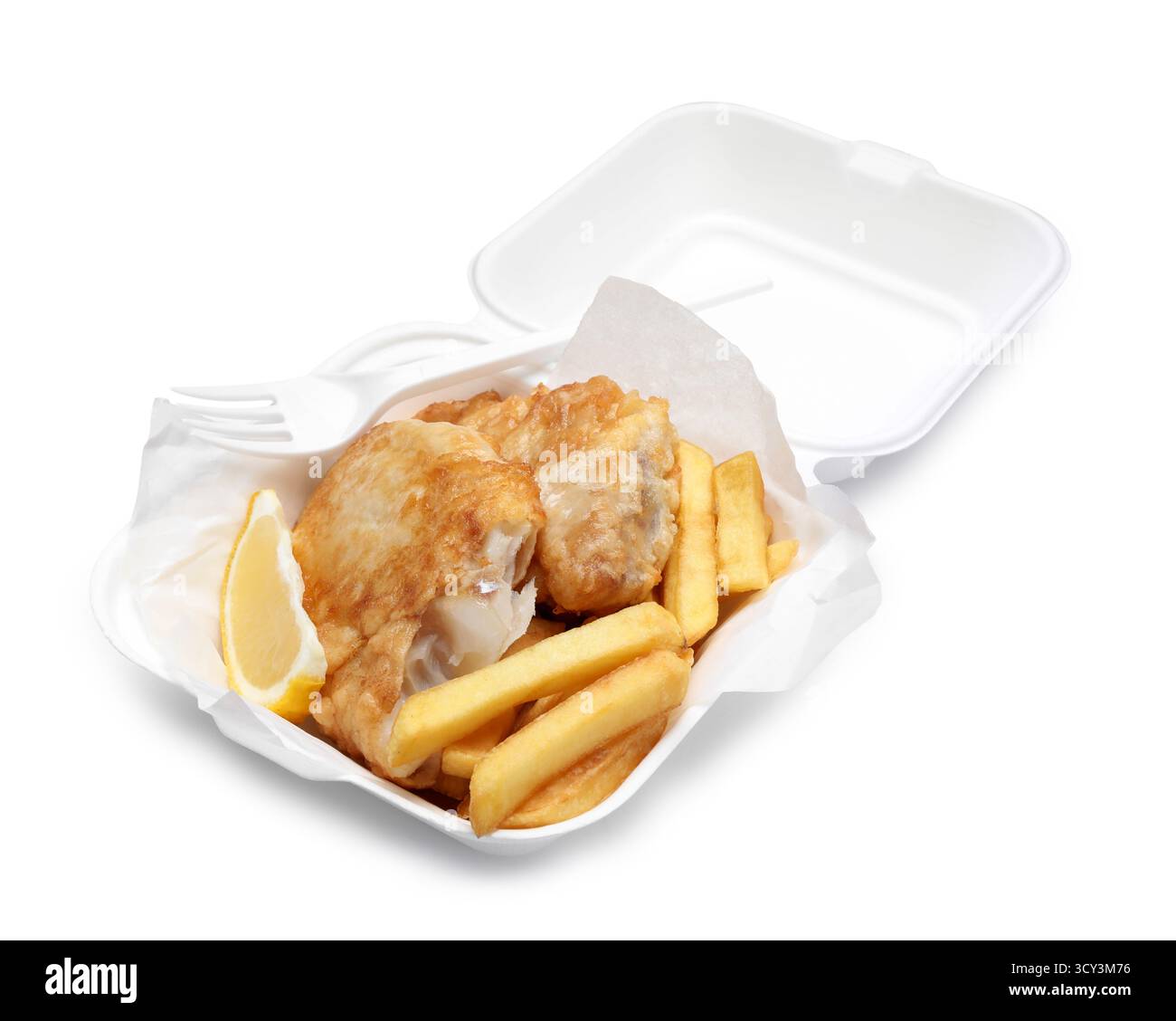 British Traditional Fish and chips with lemon in foam takeout container ...