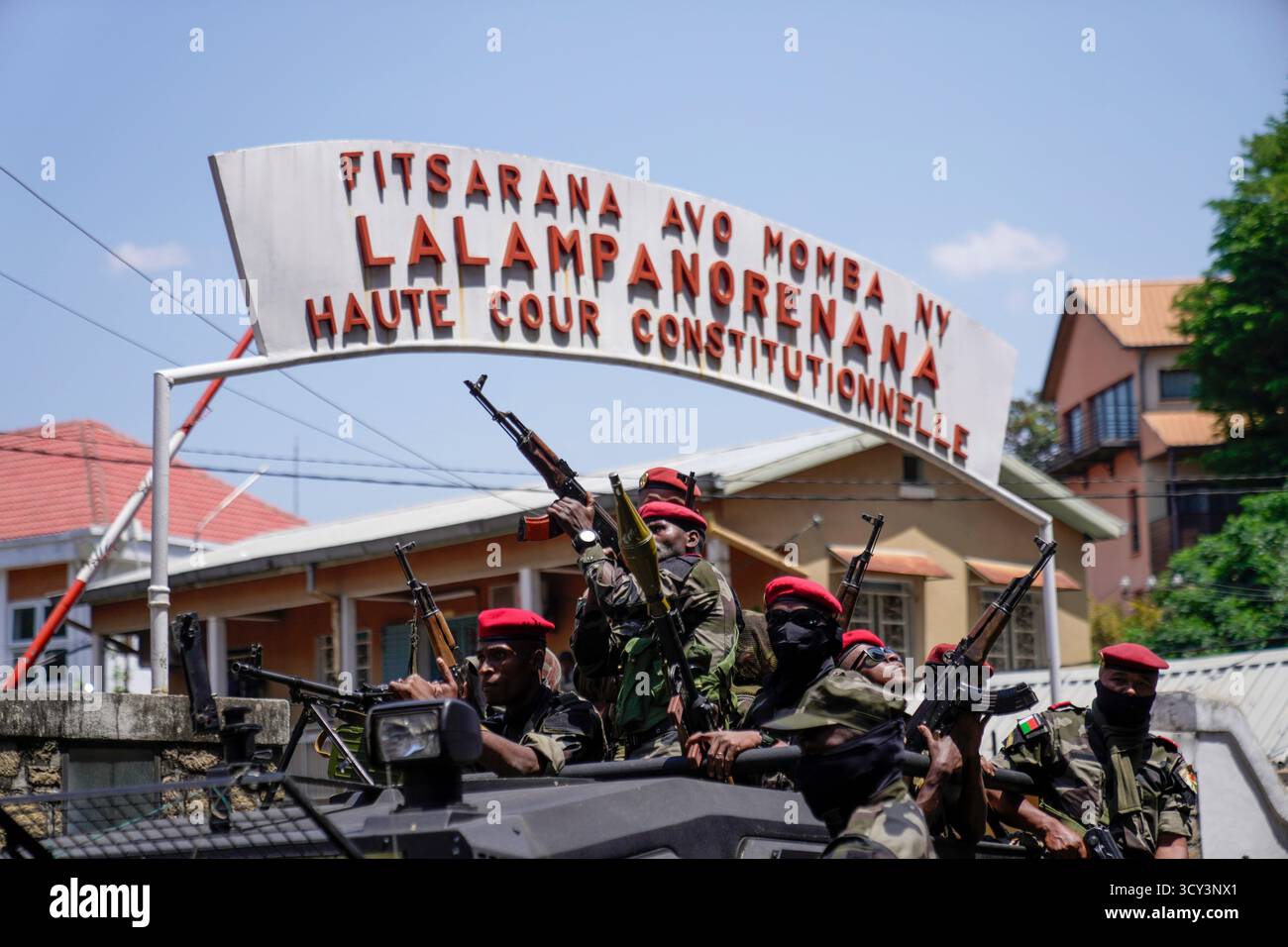 Soldiers loyal to Col. Michael Randrianirina guard the entrance of the ...