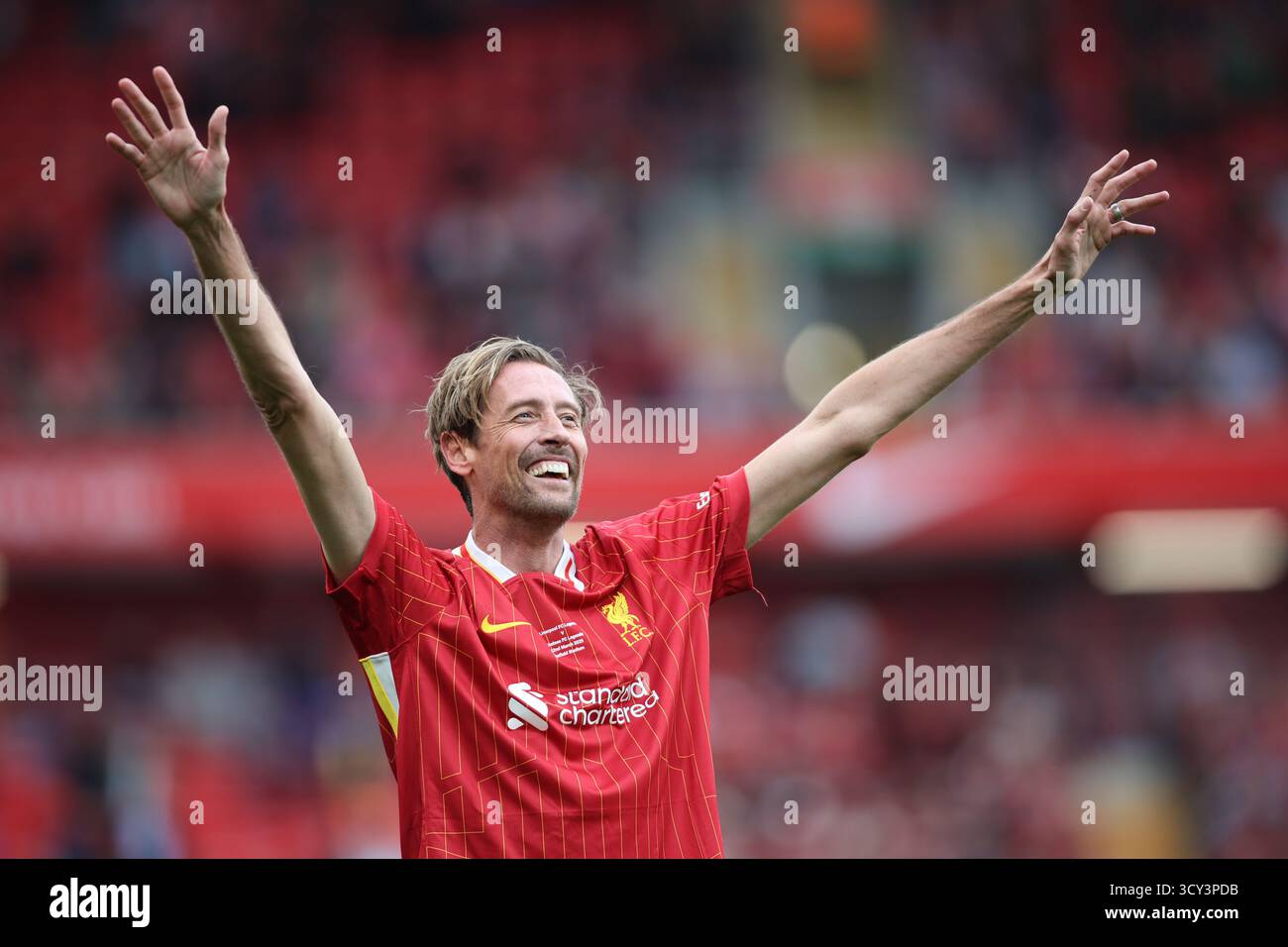 Peter Crouch celebrating his goal at the match Liverpool FC Legends vs ...