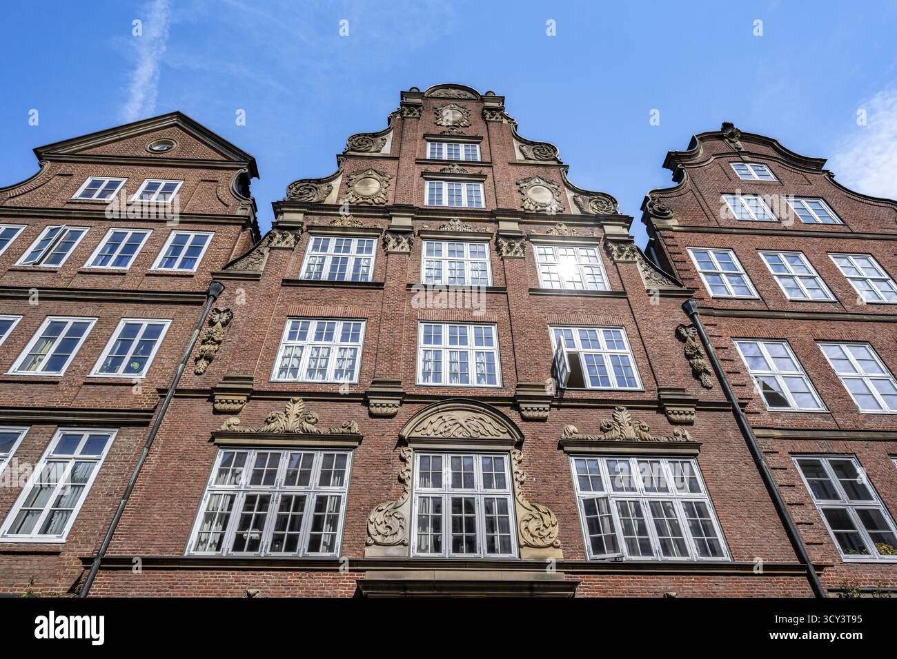Facades of the historic brick buildings in Peterstrasse ...