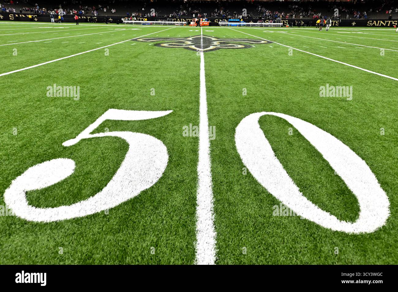 A detail view of the 10-yard line painted on the turf at the Caesars ...