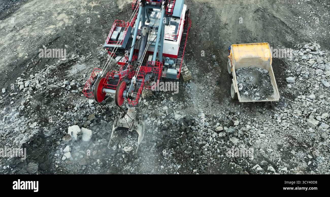 Excavator loading rocks dump hi-res stock photography and images - Alamy