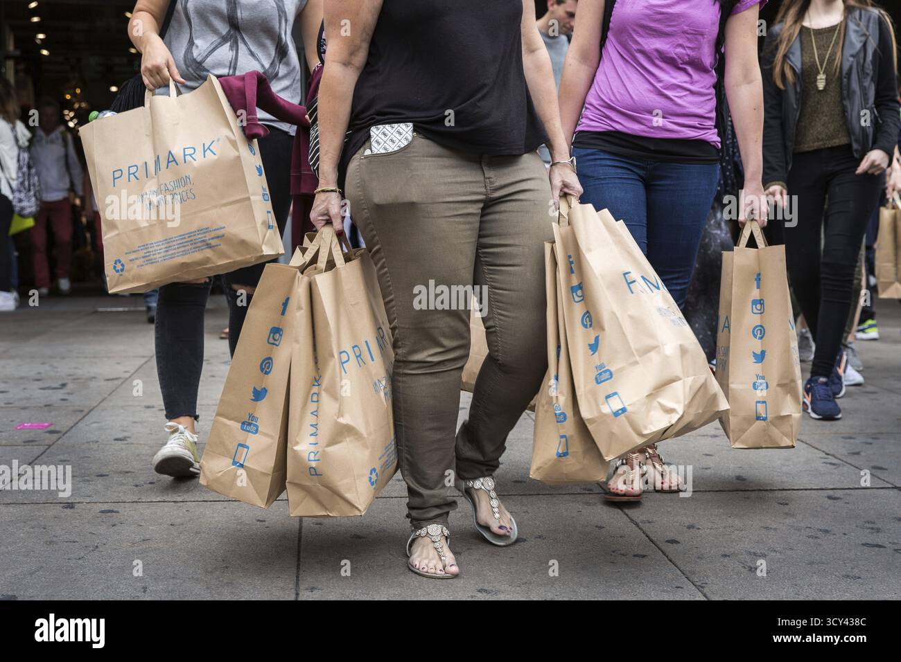 DEU Germany Germany Berlin Shopper in front of the Primark store at ...