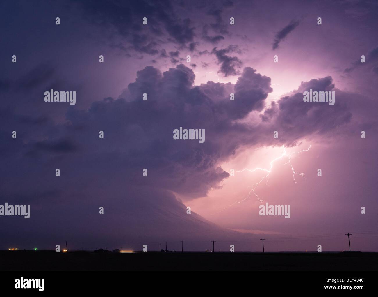 Lightning illuminates night sky in hi-res stock photography and images ...