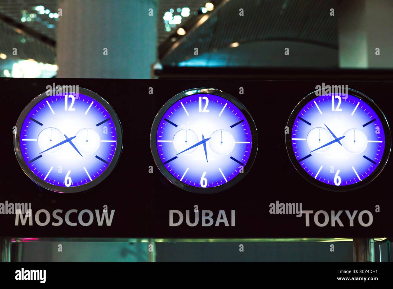Modern wall clocks in different time zones. Time of cities Moscow ...