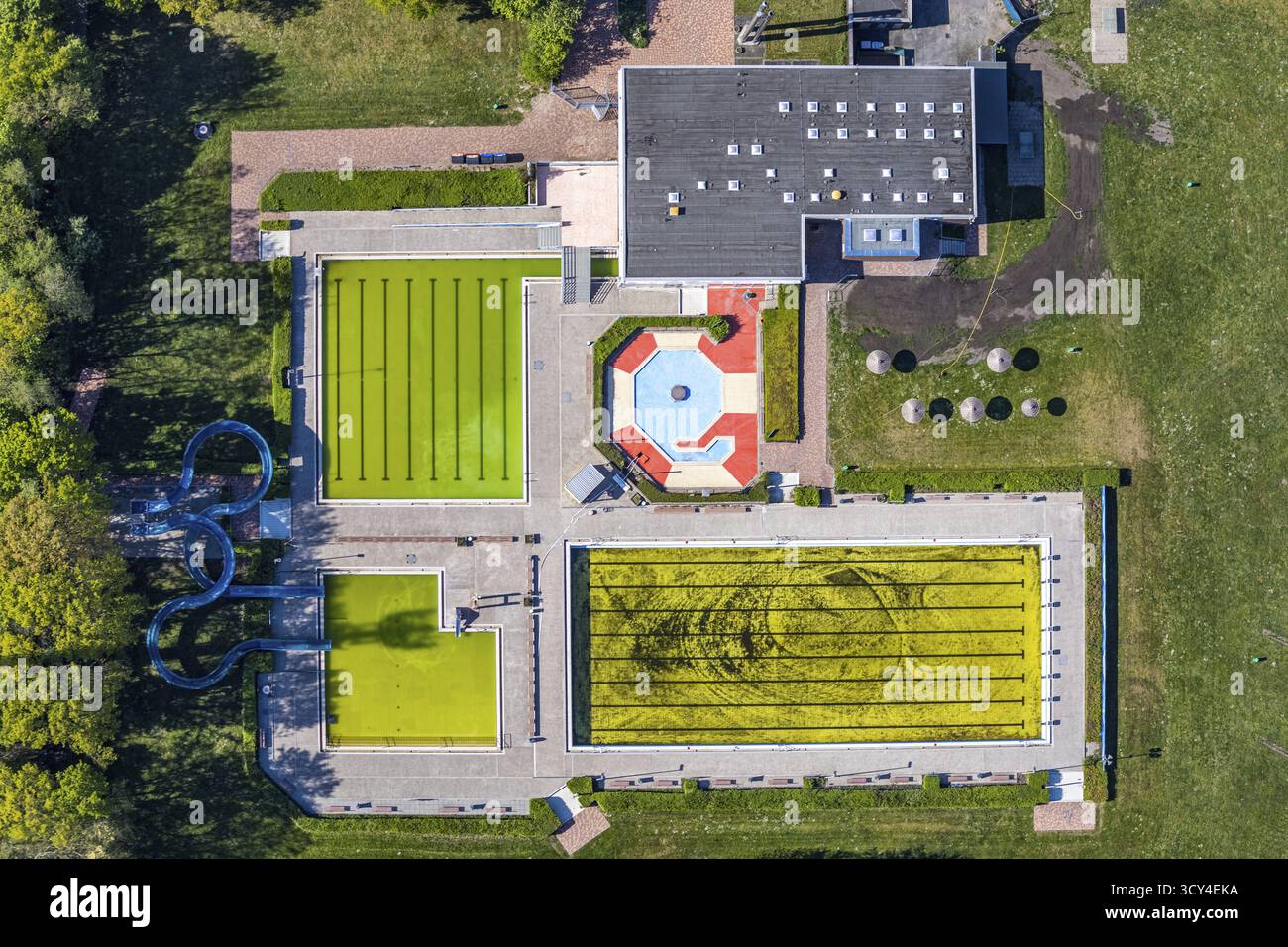 Aerial view, outdoor swimming pool south in front of the opening of the ...