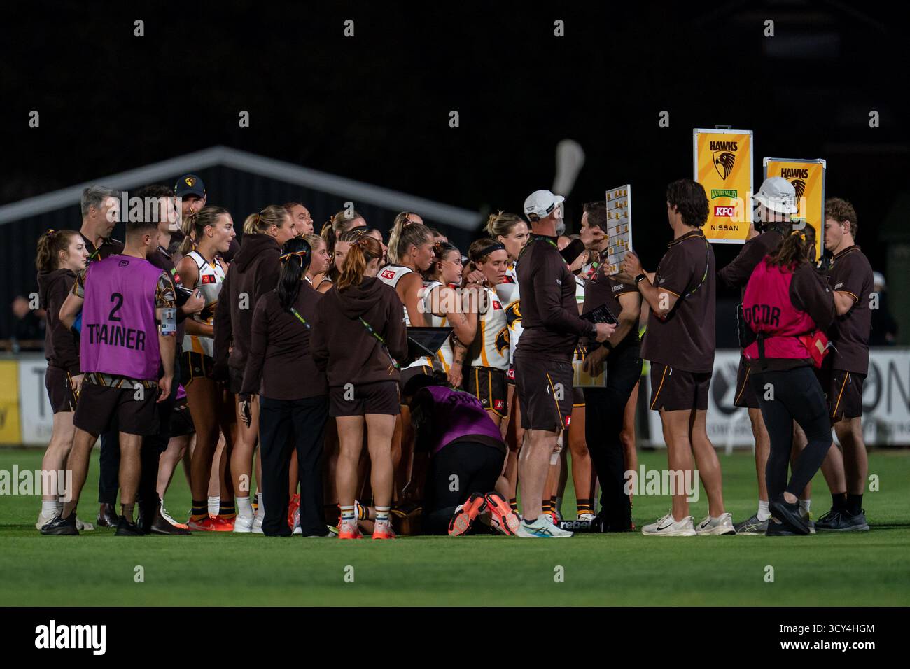 Adelaide, Australia. 17th Oct, 2025. Players of Hawthorn huddle up ...