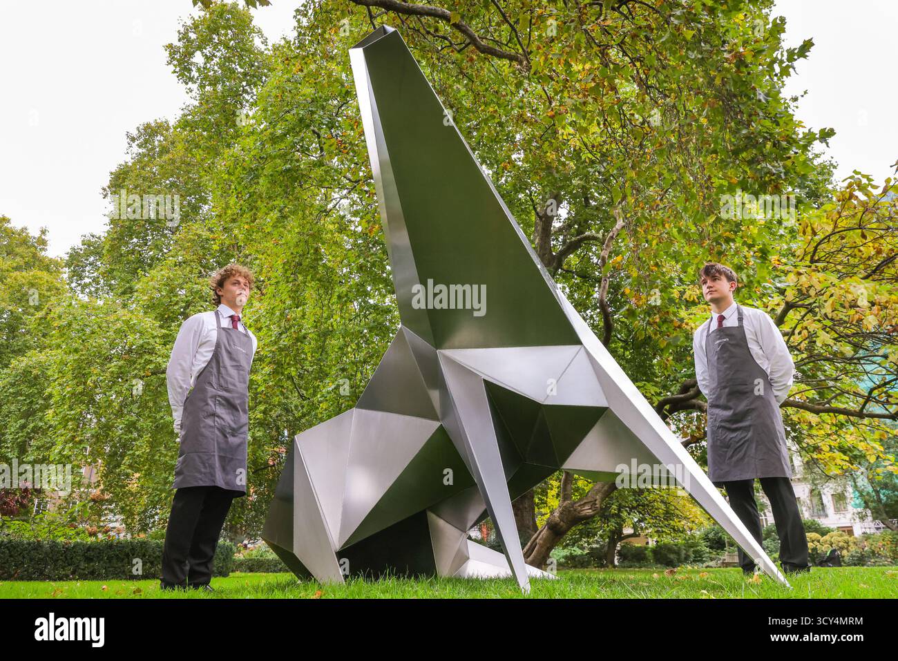 London, UK. 17th Oct, 2025. Christie's staff with LYNN CHADWICK, Beast ...