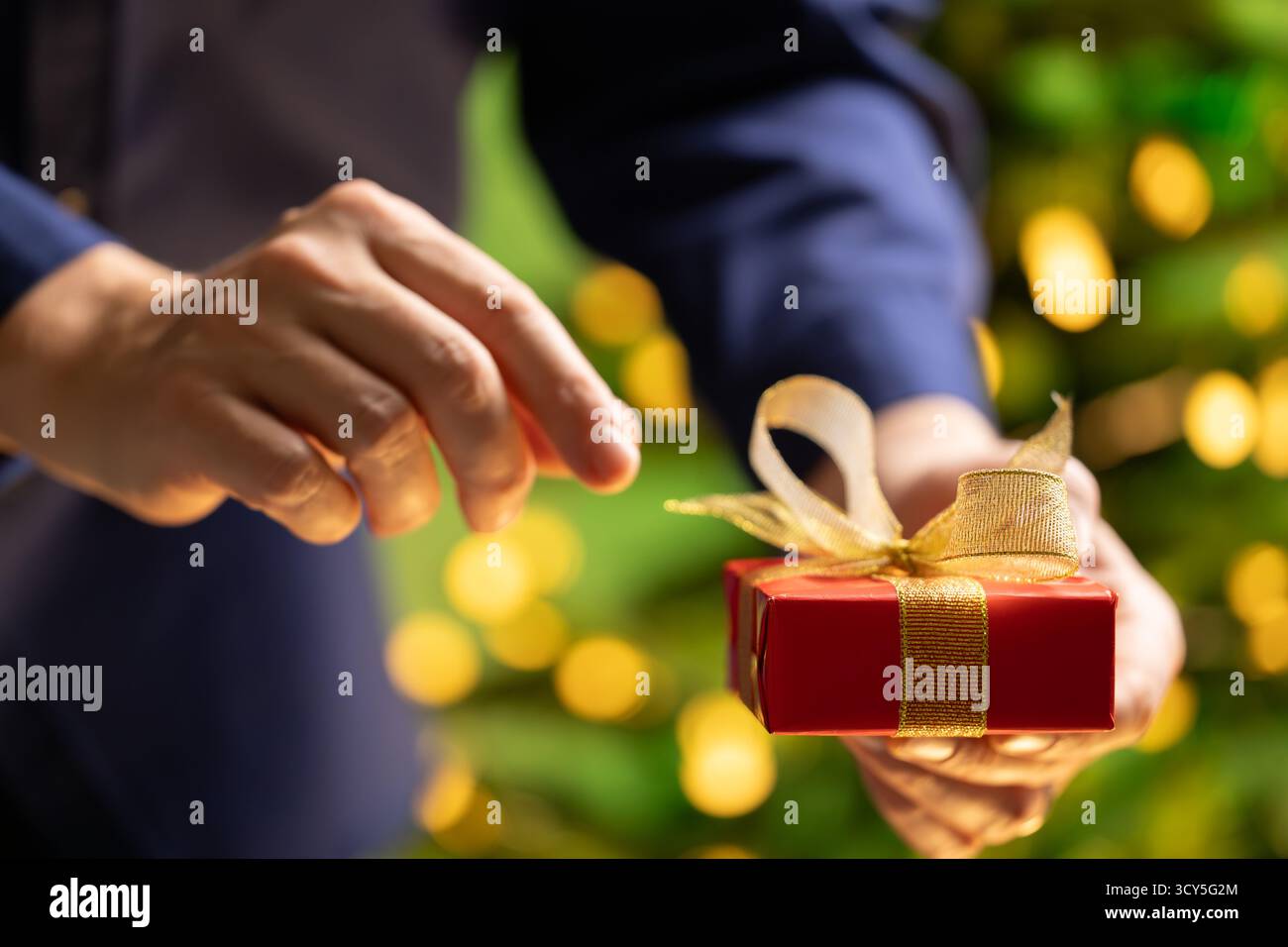 Close up hands touching christmas hi-res stock photography and images ...