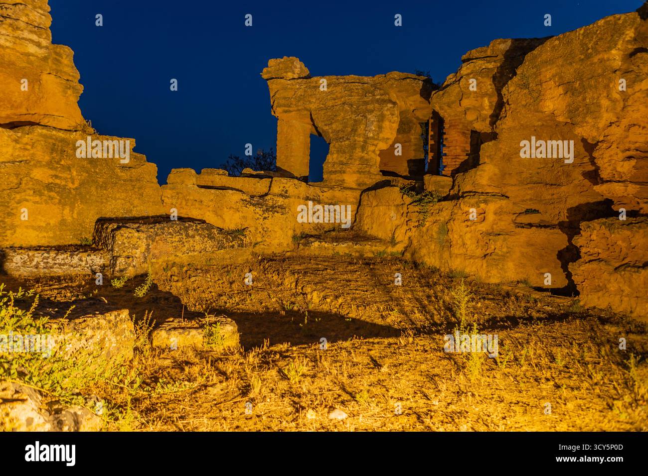 Valley of temples in Agrigento in Sicily with clouds and night ...