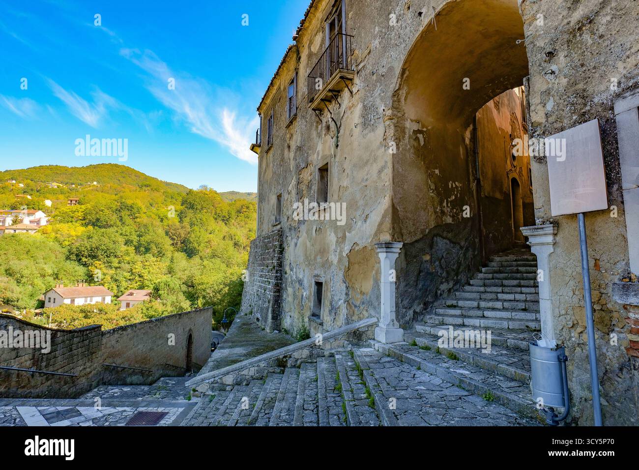Historic entrance arch in Tufo, a medieval village in the province of ...
