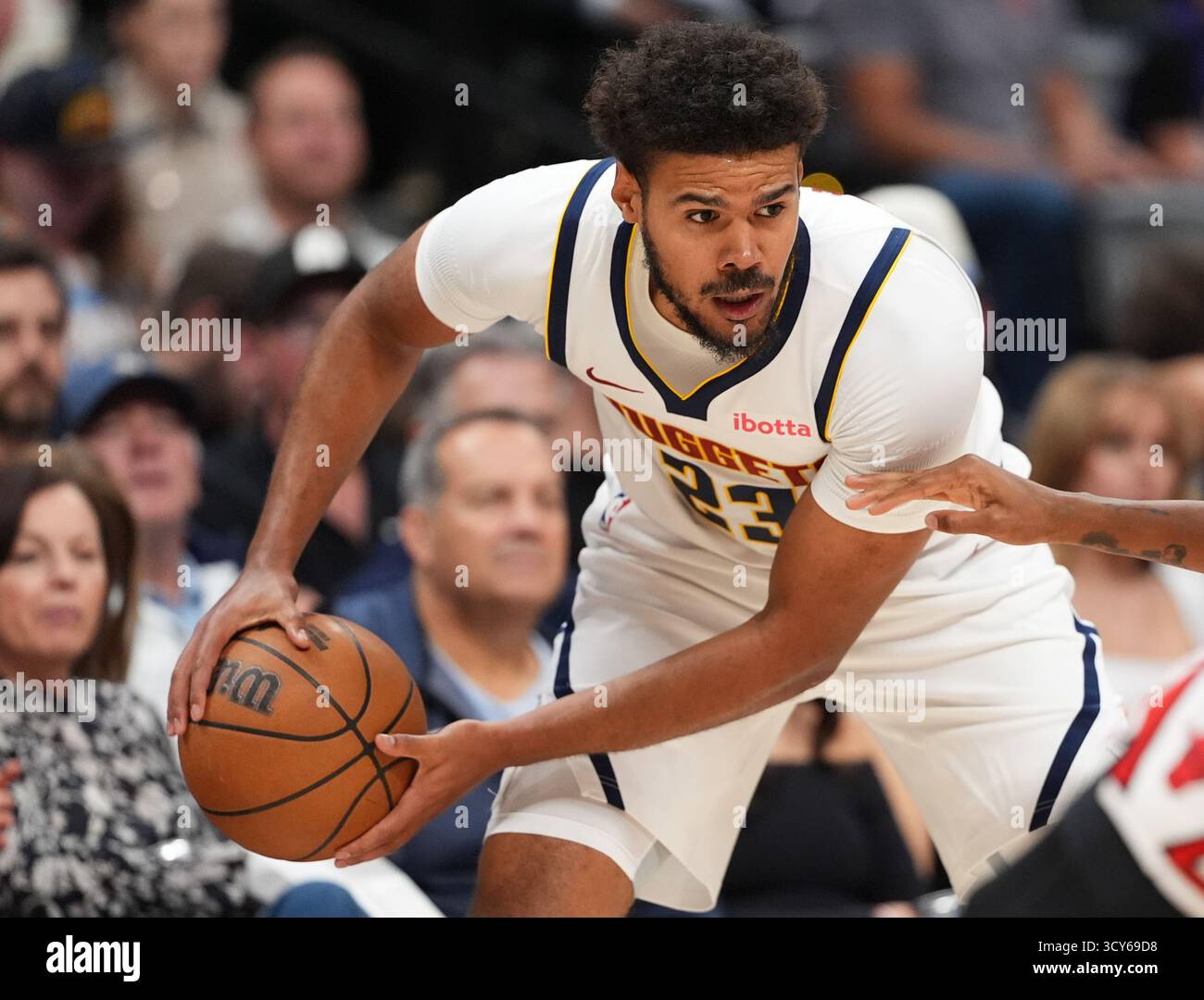 Denver Nuggets forward Cameron Johnson plays against the Chicago Bulls ...