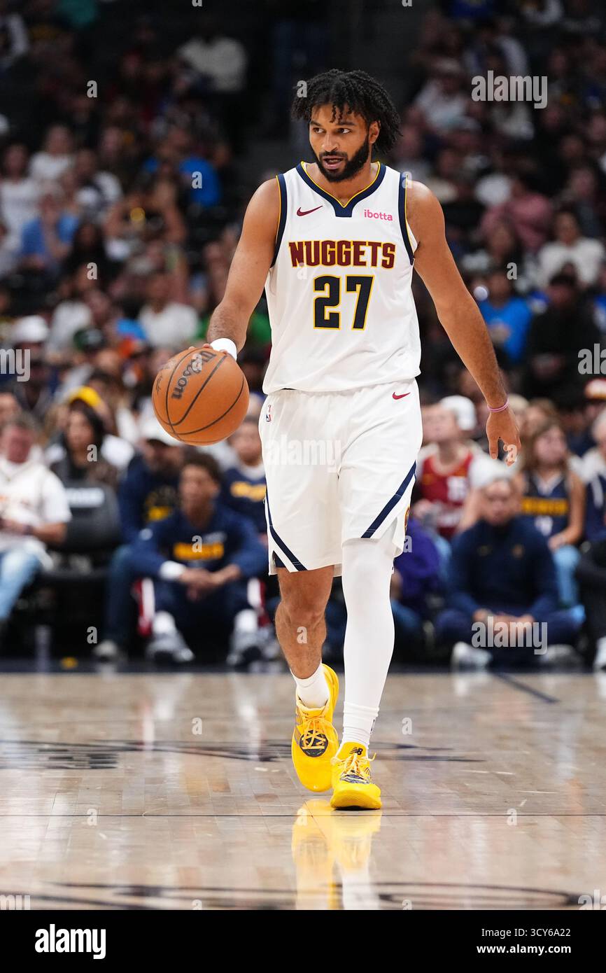 Denver Nuggets guard Jamal Murray brings the ball up court against the ...