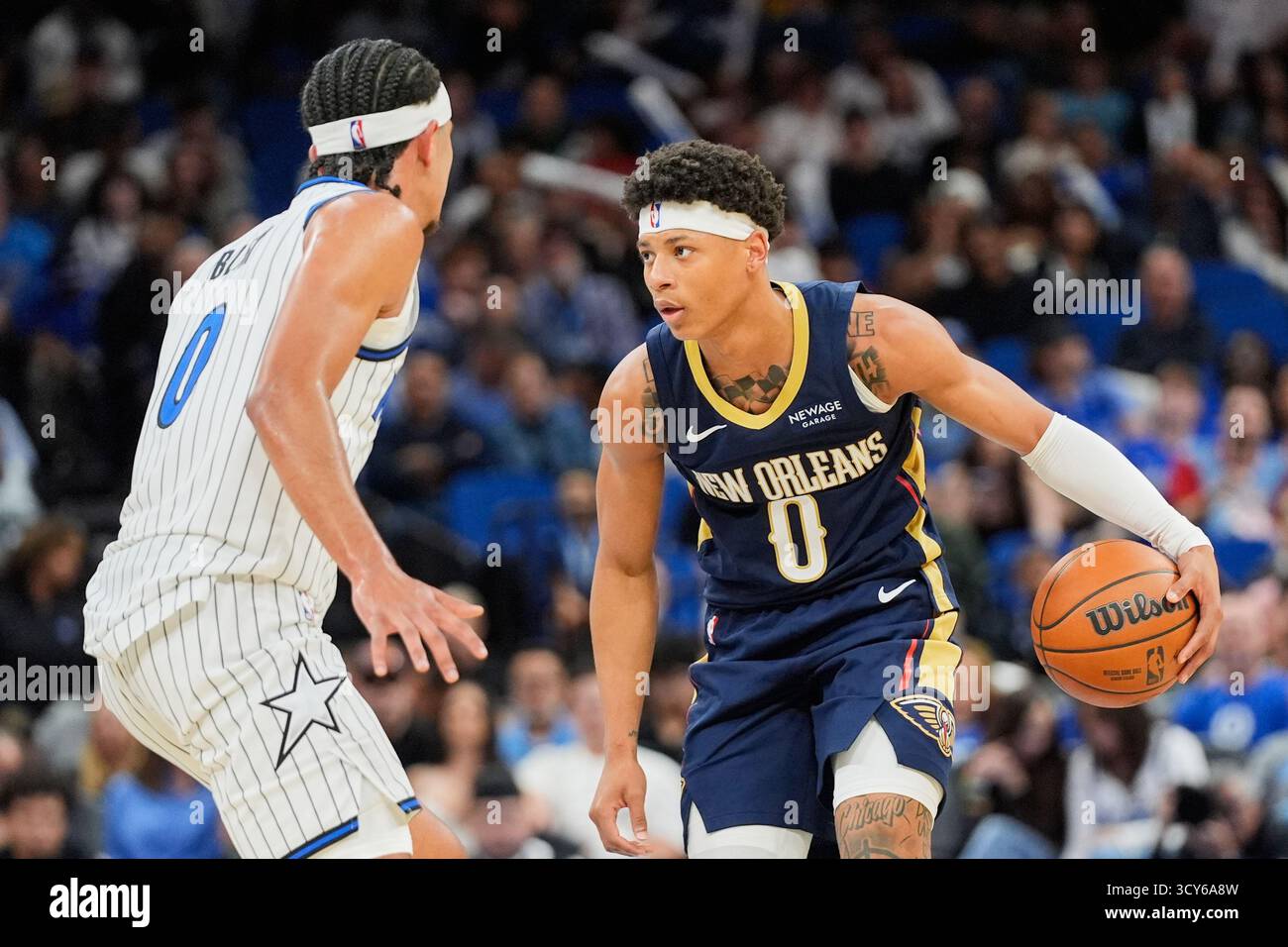 New Orleans Pelicans guard Jeremiah Fears, right, looks for an open ...
