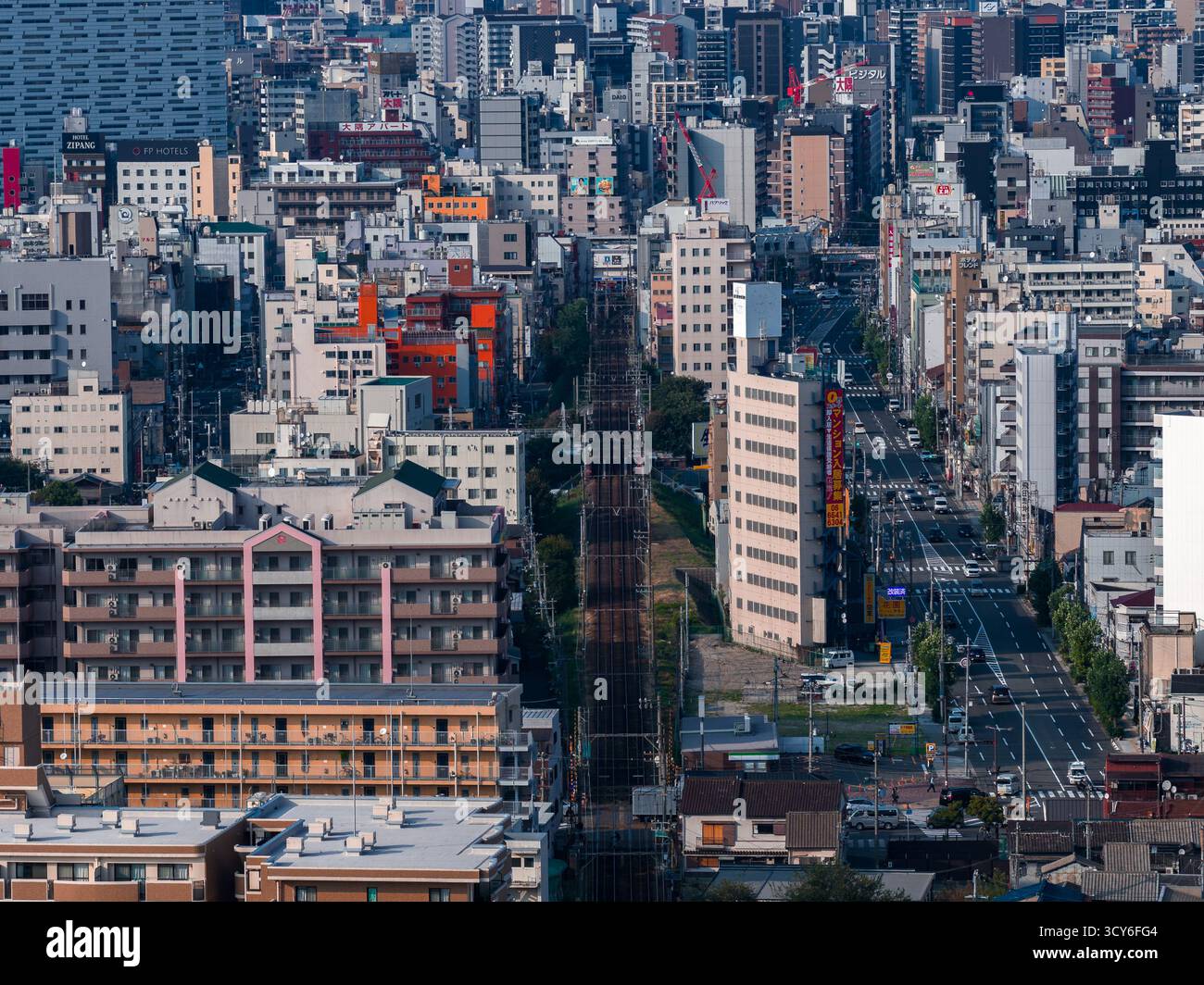 Osaka downtown grid with rail tracks, mid and high rise buildings Stock ...