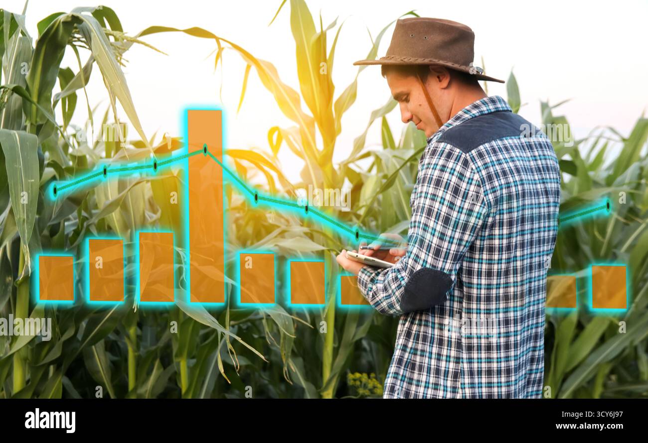 a farmer man analyzing a digital chart or graph on a tablet, focusing ...