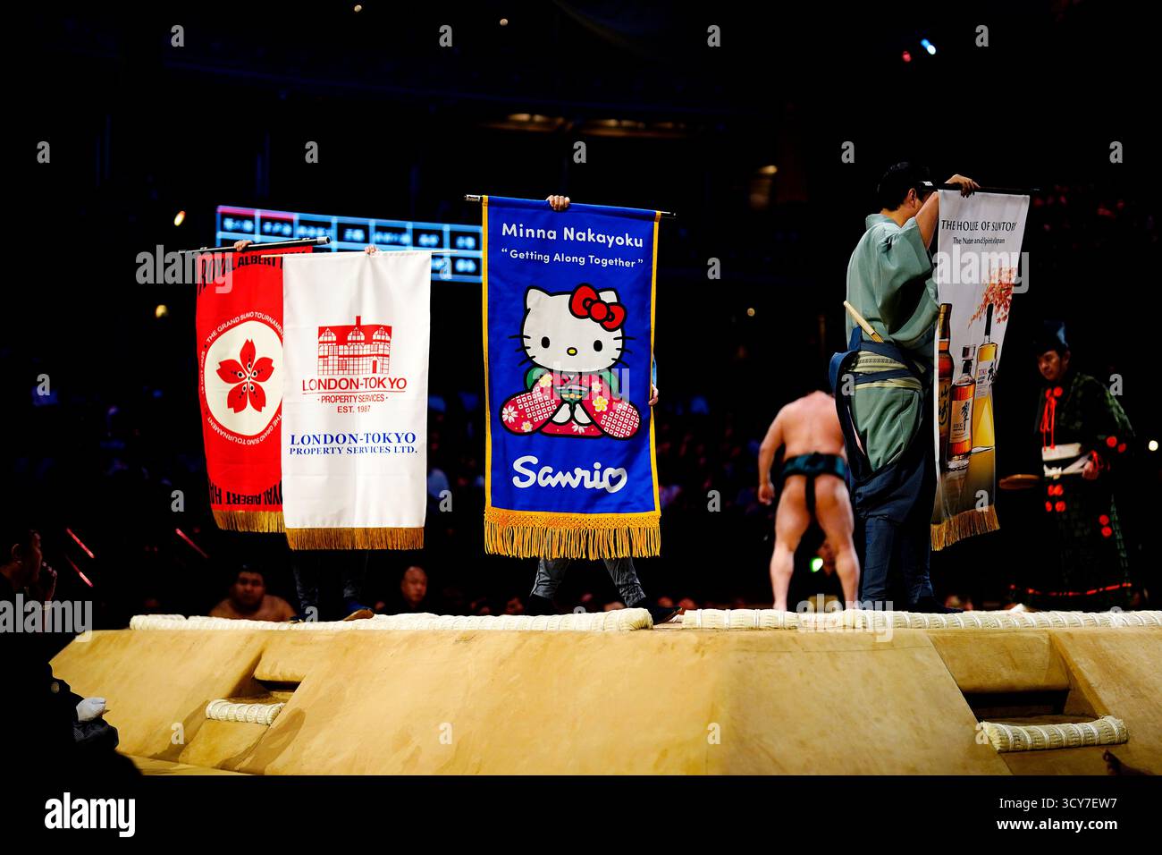 Advertising banners in between rounds on day three of the Grand Sumo ...